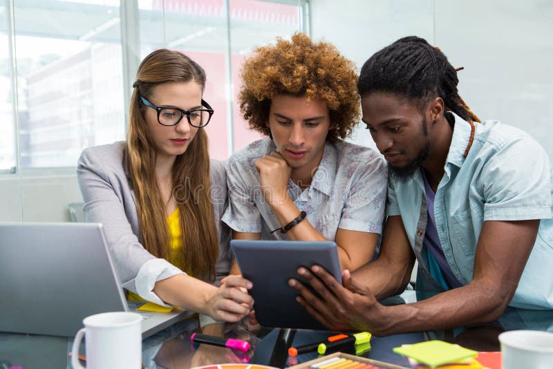 Creative Business People Looking at Digital Tablet Stock Photo - Image ...