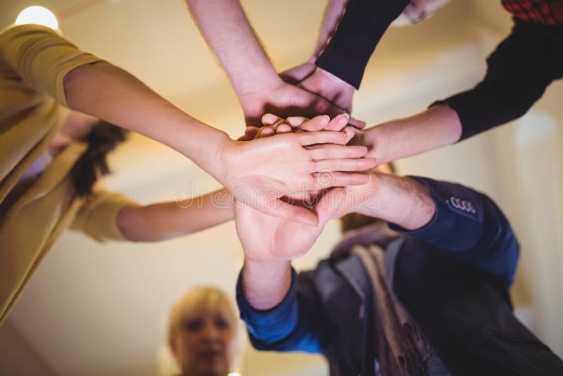 Creative Business People Stacking Hands in Office Stock Image - Image ...