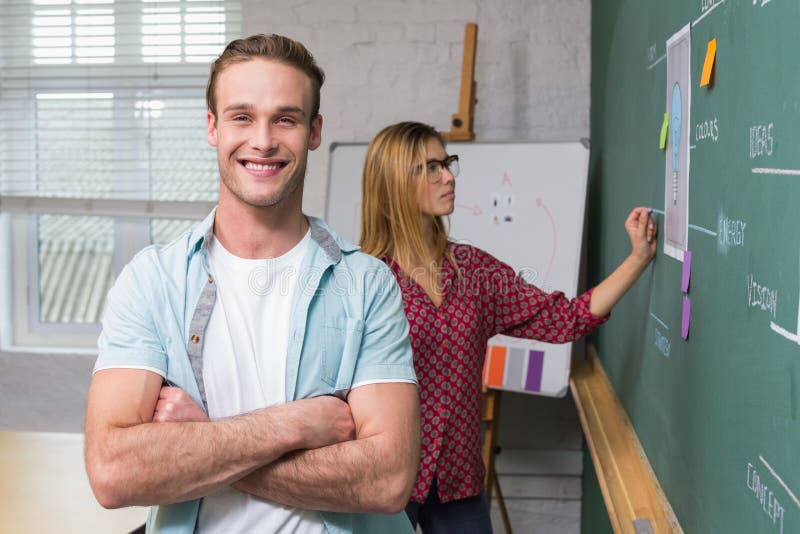 Creative Business People at Work by Blackboard Stock Image - Image of ...