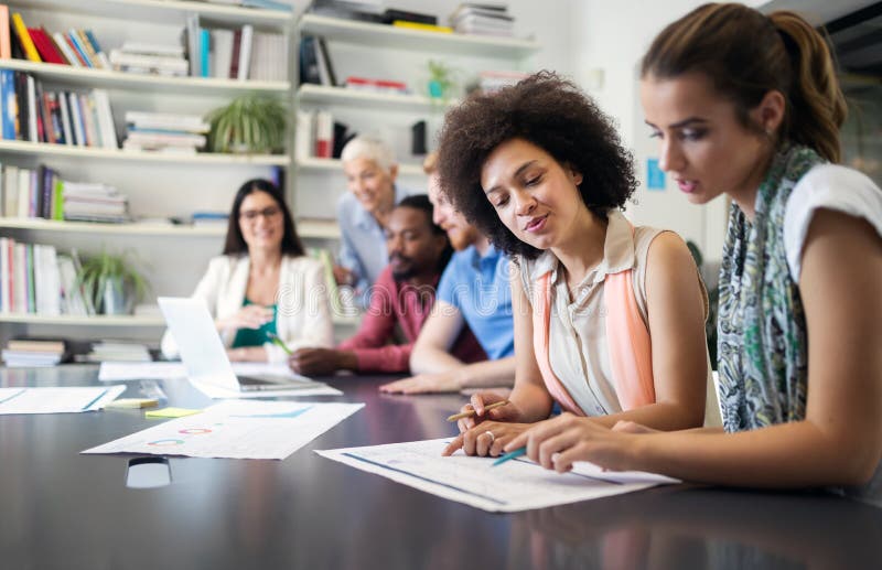 Creative Business People Working on Business Project in Office Stock ...
