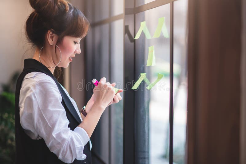 Creative Business People Writing on Sticky Notes in Office Stock Image ...
