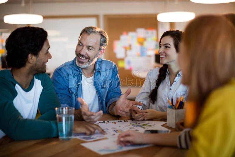Creative Business Team Discussing a Plan Stock Photo - Image of adult ...