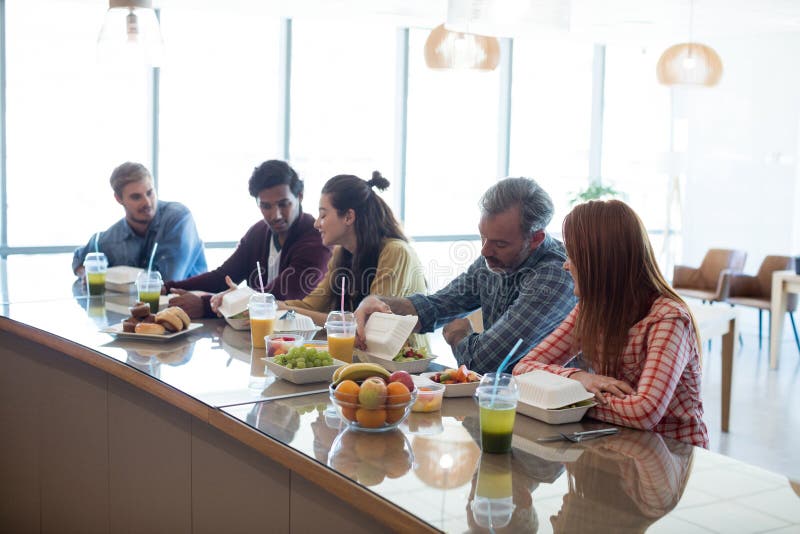 Creative Business Team Having Meal Stock Image - Image of juice ...