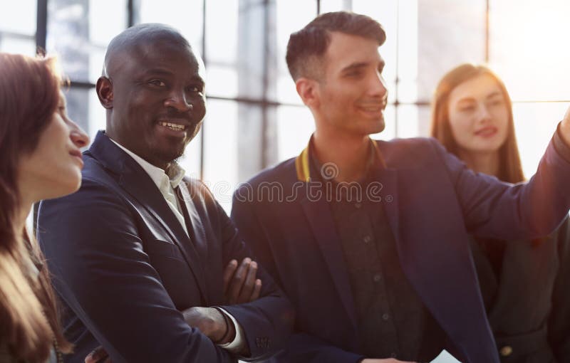 Creative Business Team Looking at Sticky Notes on Glass Window Stock ...
