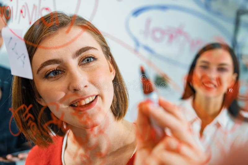 Creative Business Team Sharing Idea, Writing Down on Sticky Note. Immaculate. Stock Photo ...