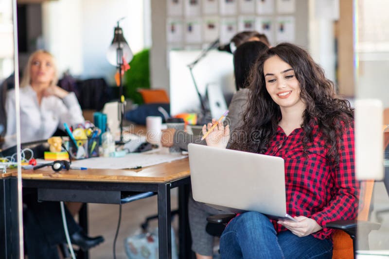 Creative Business Team Working Hard Together in Casual Office Stock ...