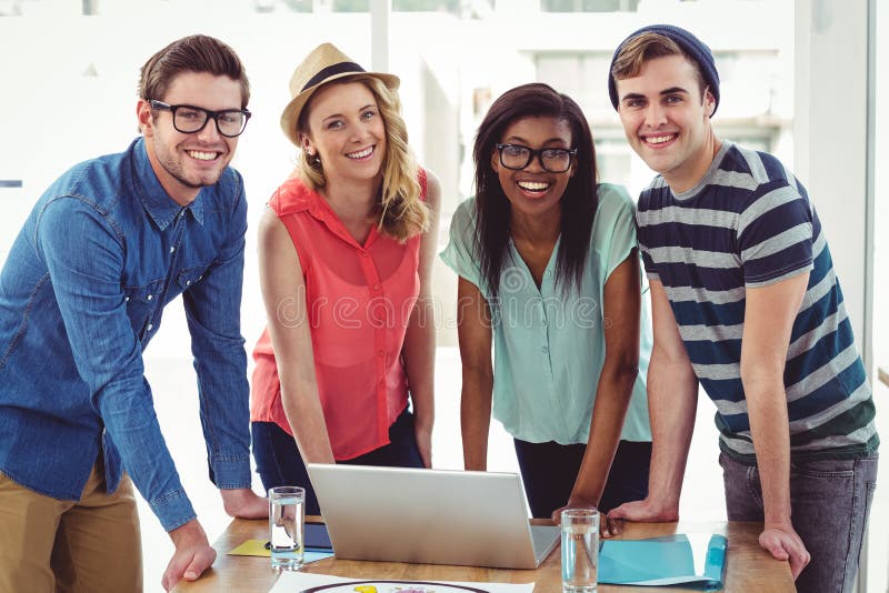 Creative Business Team Working Hard Together on Laptop Stock Photo ...