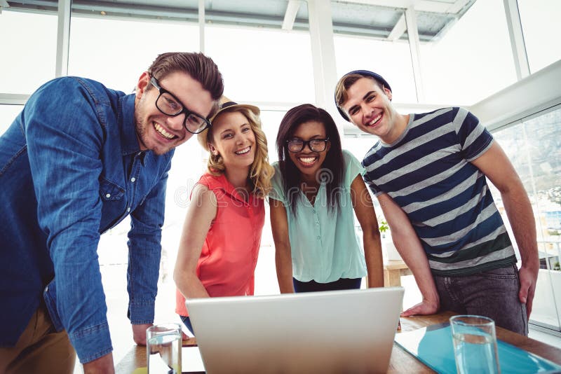 Creative Business Team Working Hard Together on Laptop Stock Photo ...