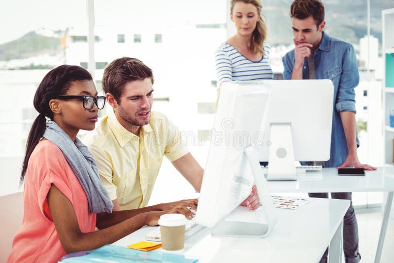 Creative Business Team Working Hard Together on Pc Stock Photo - Image ...