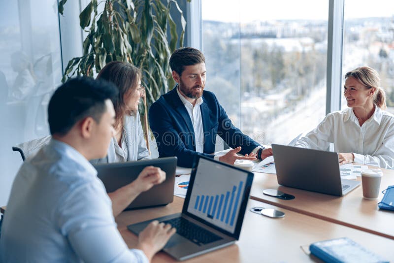 Creative Business Team Working on Project in Modern Office with ...