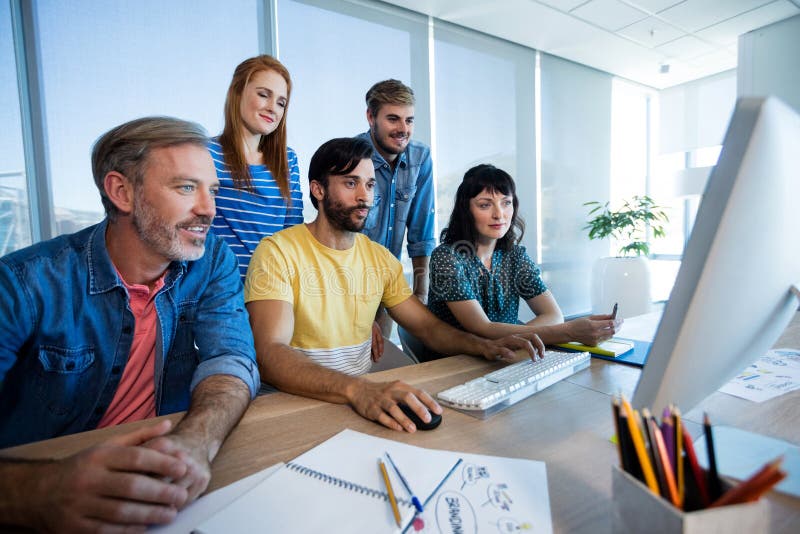 Creative Business Team Working Together on Desktop Pc Stock Image ...