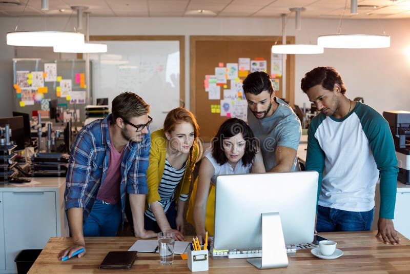 Creative Business Team Working Together on Desktop Pc Stock Photo ...