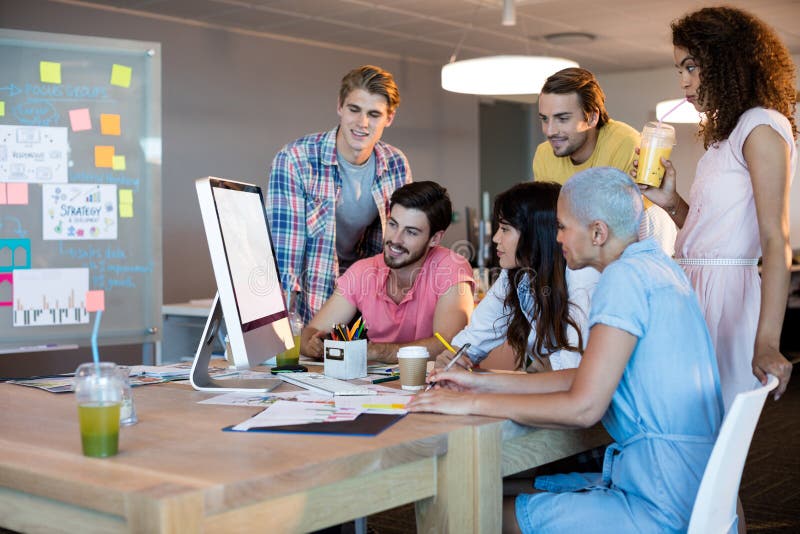 Creative Business Team Working Together on Desktop Pc Stock Photo ...