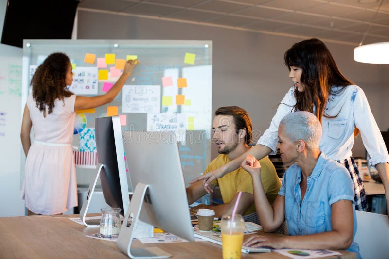 Bored Creative Business Team Attending a Meeting Stock Photo - Image of ...