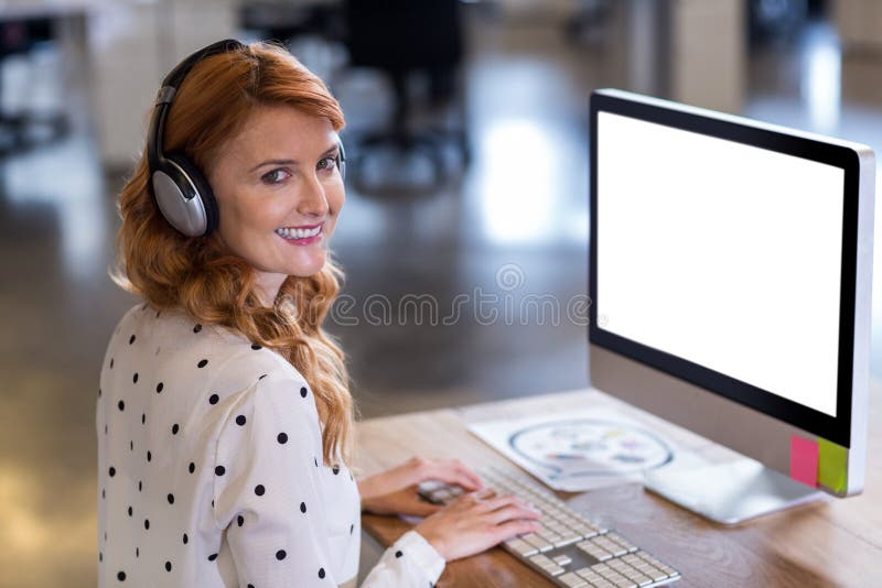 Creative Businesswoman Working on Computer Stock Photo - Image of ...
