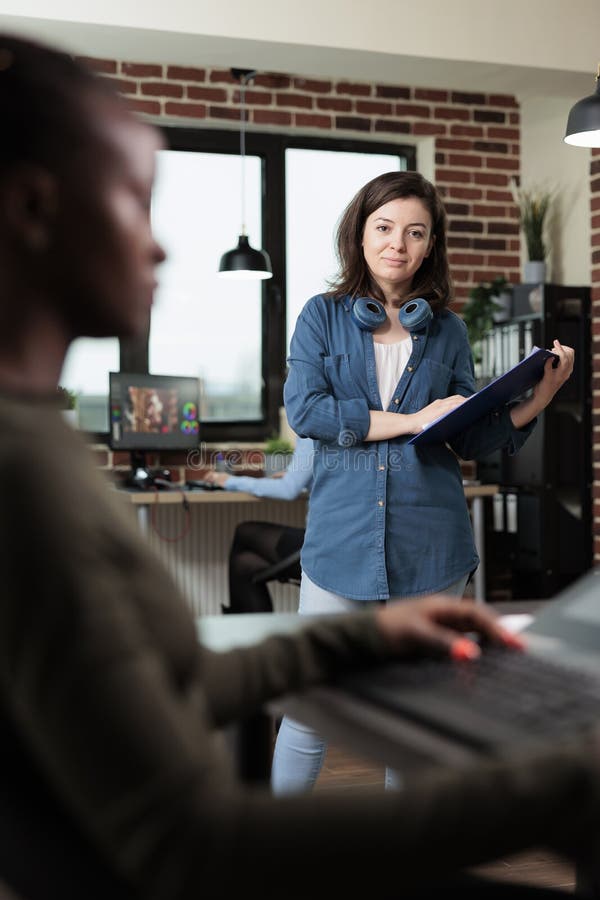 Creative Company Professional Worker Standing in Front of Vertical ...