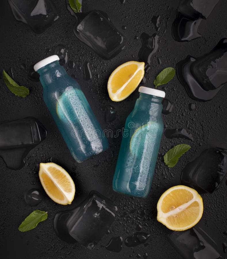 Creative Composition of Blue Detox Water with Fresh Lemon Stock Photo ...