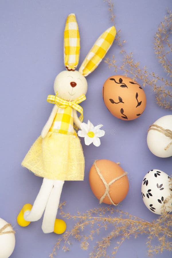 Creative Composition with Cute Easter Bunny Rabbit and Egg on Purple ...