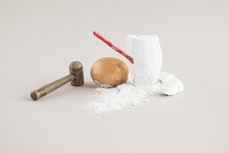 Creative Composition with Easter Golden Egg, Hammer, Nail and Old ...