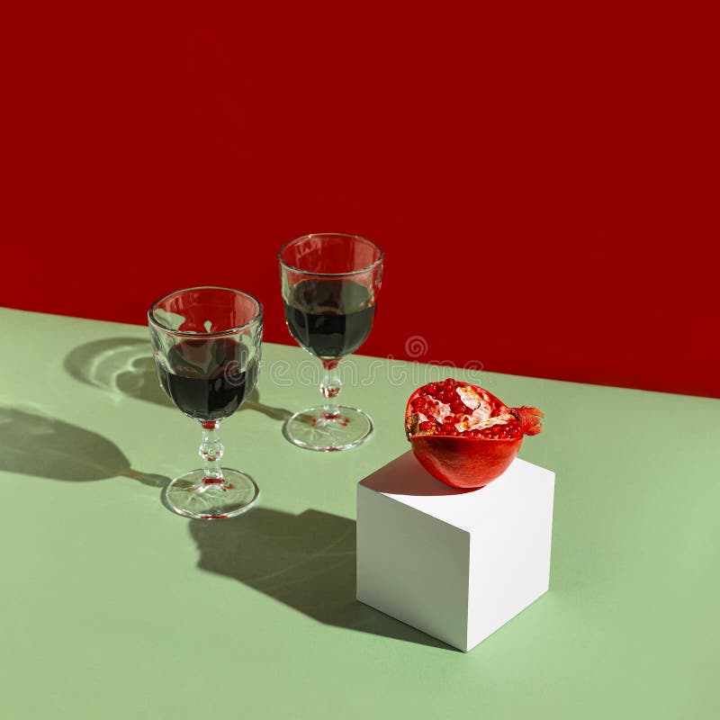 Creative Composition Made of Pomegranate and Glasses of Wine on Bright ...