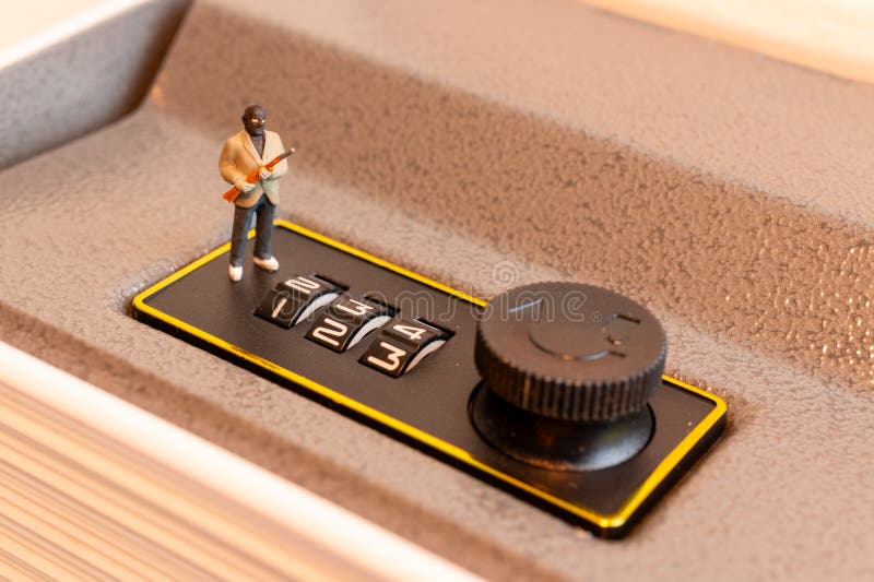 Miniature Thief Cracking Safe Lock Combination Stock Image - Image of ...