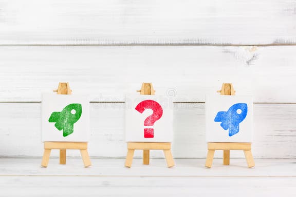 Creative Decision-Making Concept with Rocket Symbols and Question Mark ...