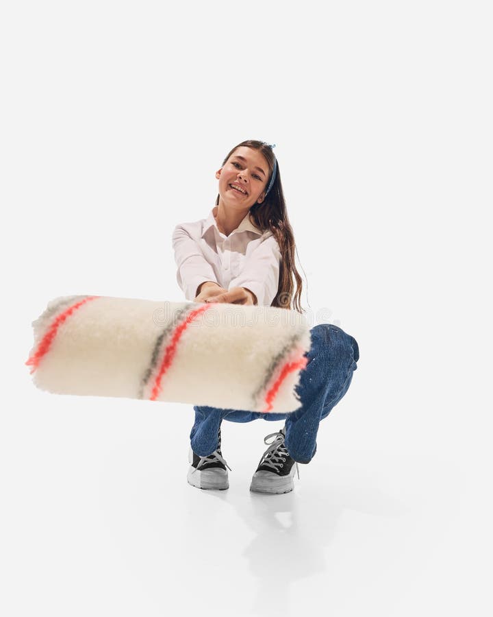 Creative Decorator Dressed Casual Attire Squats with Paint Roller ...