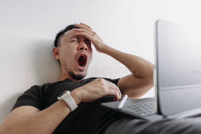 Creative Designer Man Take a Nap Sleeping on Sofa while Working. Stock ...