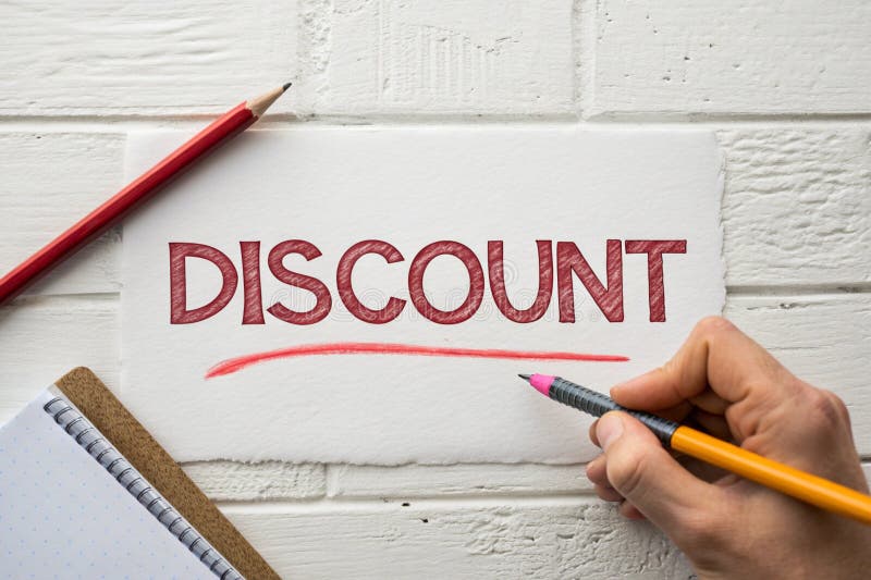 Creative Discount Design with Bold Red Text and Writing Tools on a ...
