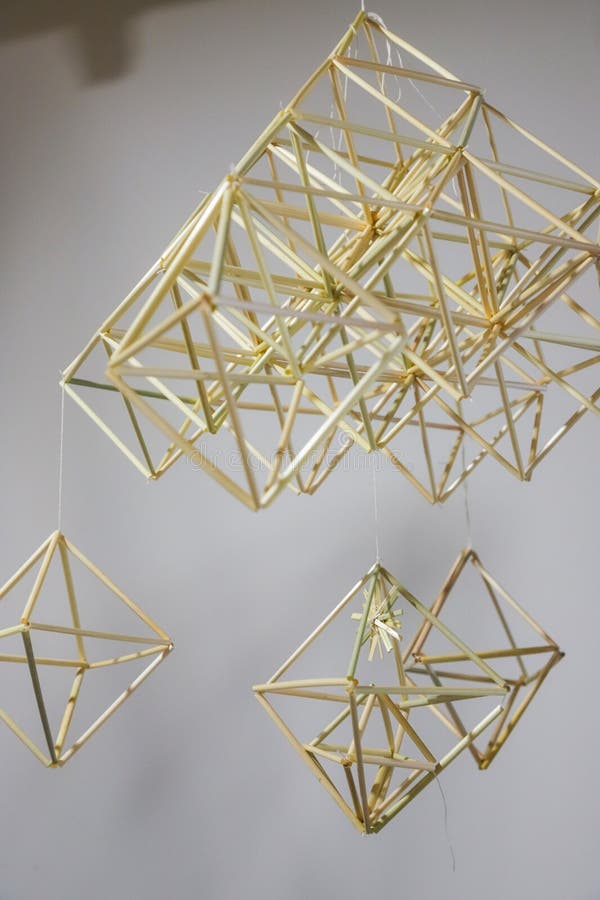 Unique Hanging Sculpture Made of Straw Sticks Suspended in a Minimalist ...