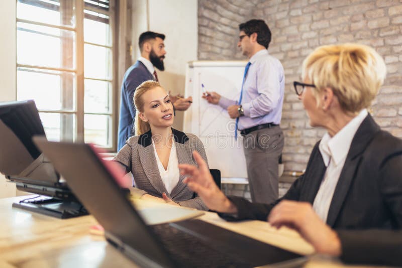 Colleagues Team Discuss Online Project Use Computer at Workplace Stock ...