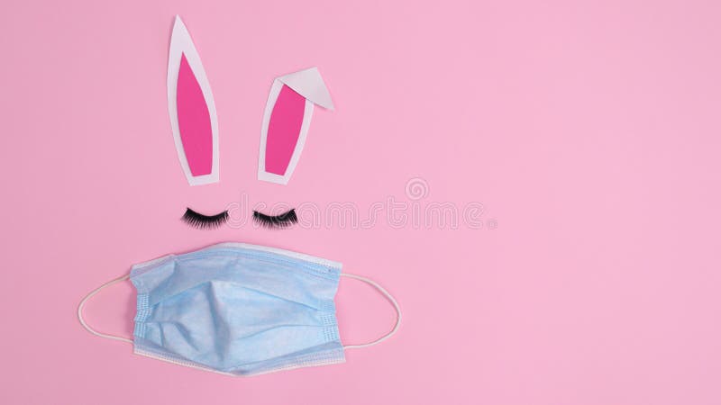 Creative Easter Bunny with Face Mask on Pastel Pink Background. Flat ...
