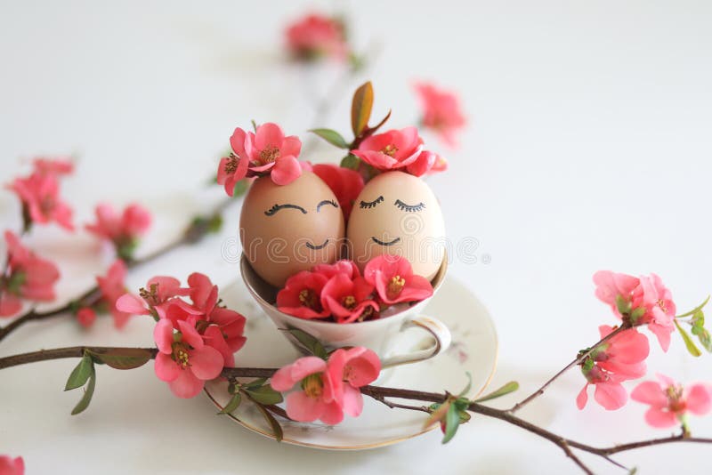 Creative Easter Eggs with Cute Face, Sleepy Eyes and Spring Flowers in ...
