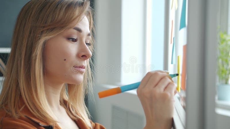 Creative Employee Working at Project in Office Writing on Colorful ...