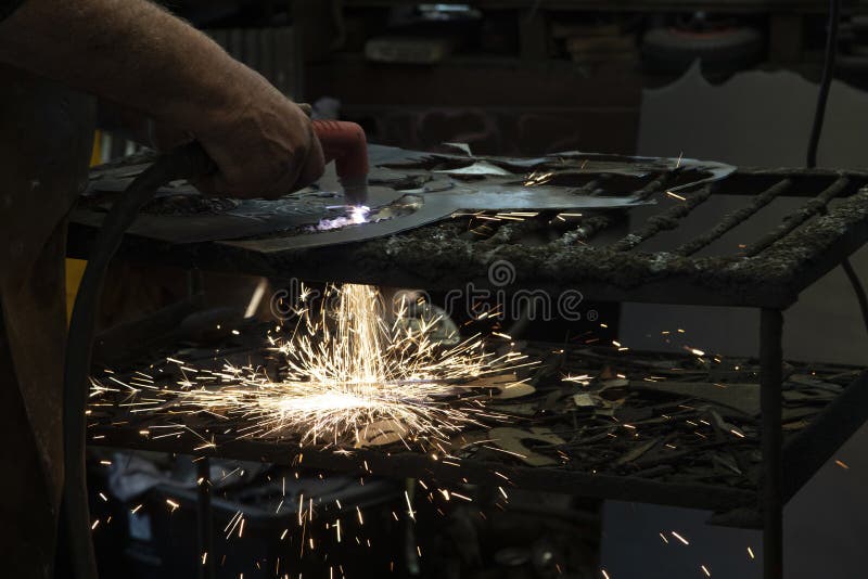 Creative Engineering Light Sparks from Welding with Shed Interior Stock ...