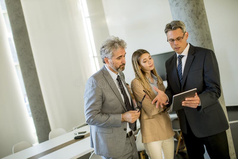 Creative Executives Using Digital Tablet in Office Stock Photo - Image ...