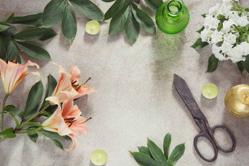 Creative Female Table with Candles, Scissors and Flower. Top View with ...