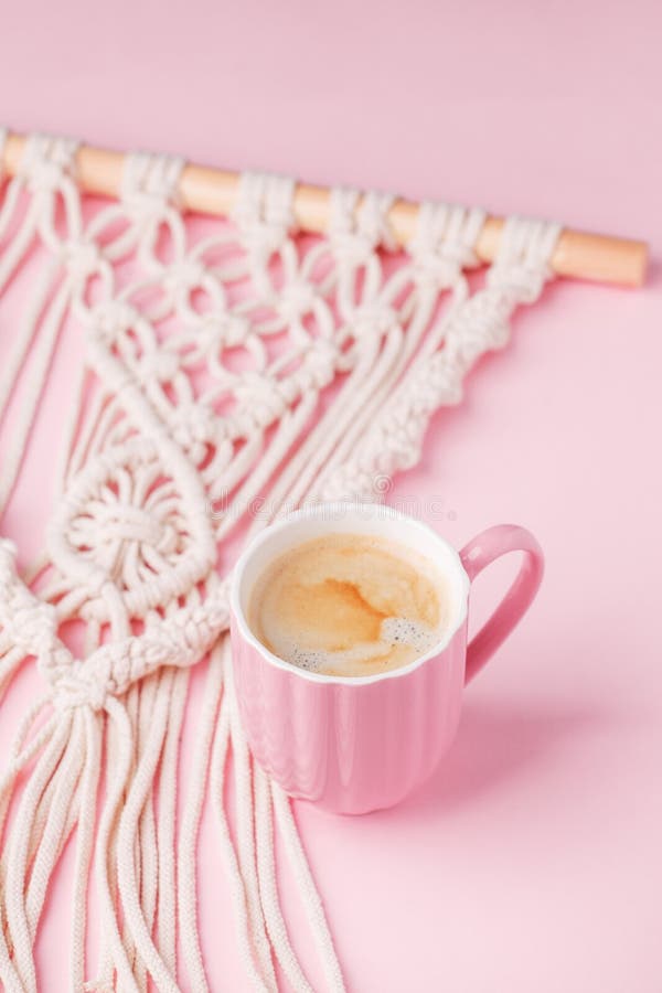 Creative Flat Lay Concept, Coffee Cup and Macrame Panel on Pastel Pink ...
