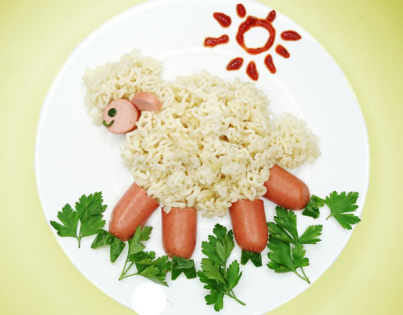 Creative Food Dinner with Pasta and Sausage Stock Photo - Image of ...