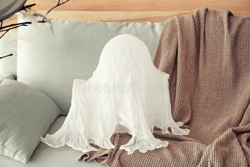 Creative Ghost Prepared for Halloween Celebration on Sofa Stock Photo ...