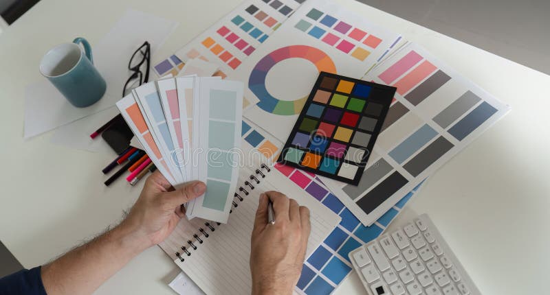 Creative Graphic Designer Selecting Color Palettes for Innovative ...