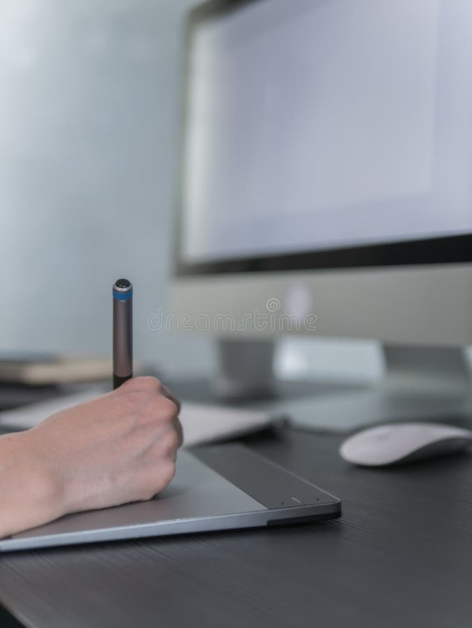 Creative or Graphic Designer Using Digital Tablet and Computer in the ...