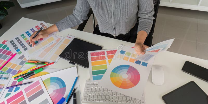 Creative Graphic Designer Working on Color Palettes and Design Concepts ...