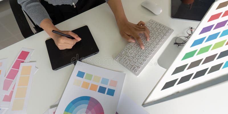 Creative Graphic Designer Working on Color Palettes and Digital Designs ...