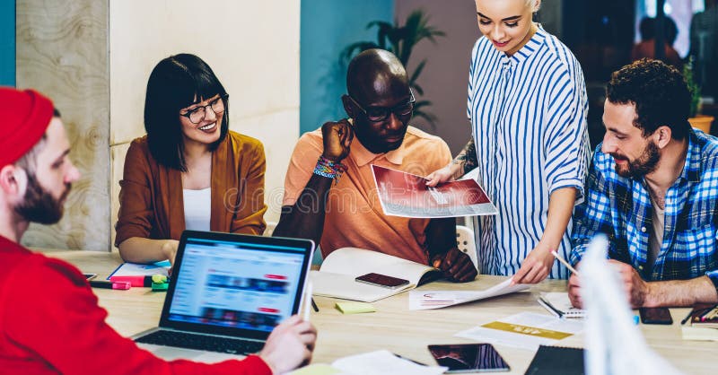 Creative Group of Designers Teamworking on Meeting Table Share Ideas ...