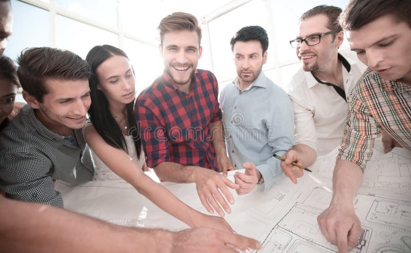 Creative Group of Young Architects, Showing You Stock Photo - Image of ...