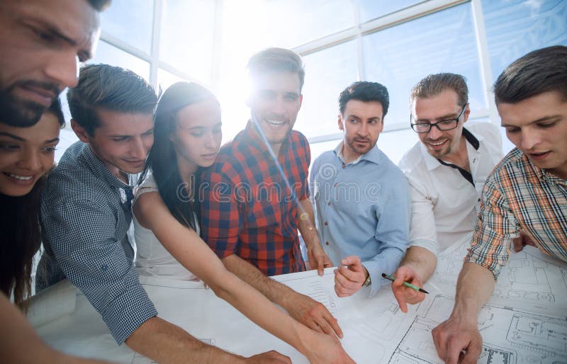 Creative Group of Young Architects, Showing You Stock Image - Image of ...