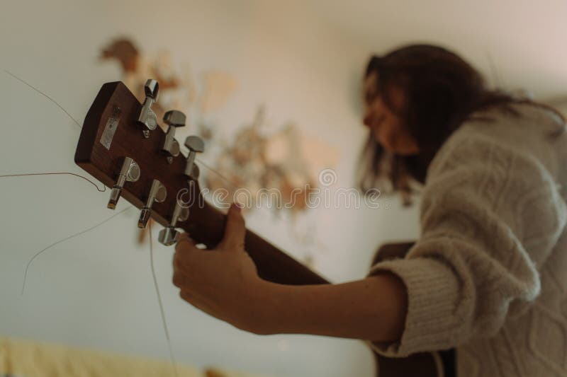 Creative Hobby. Talented Young Female Musician Sit in Armchair Alone ... Creative Hobby. Talented Young Female Musician Sit in Armchair Alone ...
