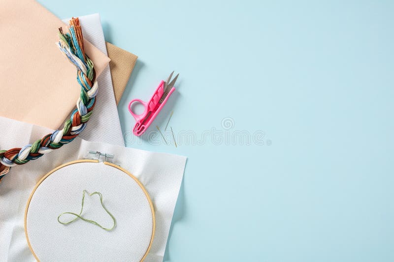 Creative Layout with Embroidery Materials on Blue Background Stock ...