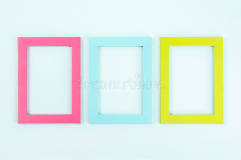 Creative Layout Made of Three Bright Colored Frames on Blue Background ...